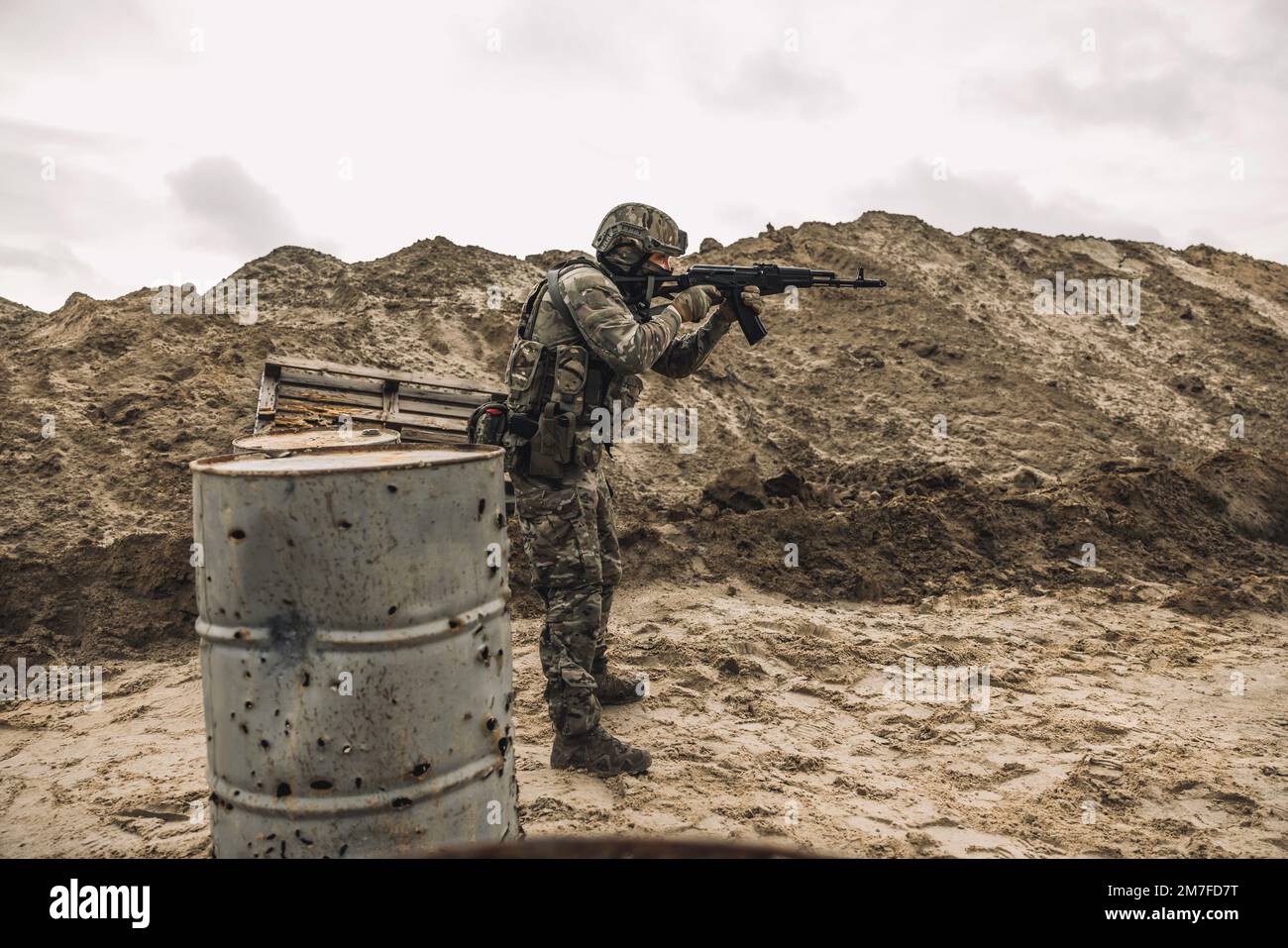 Soldier shooting from the rifle Stock Photo - Alamy