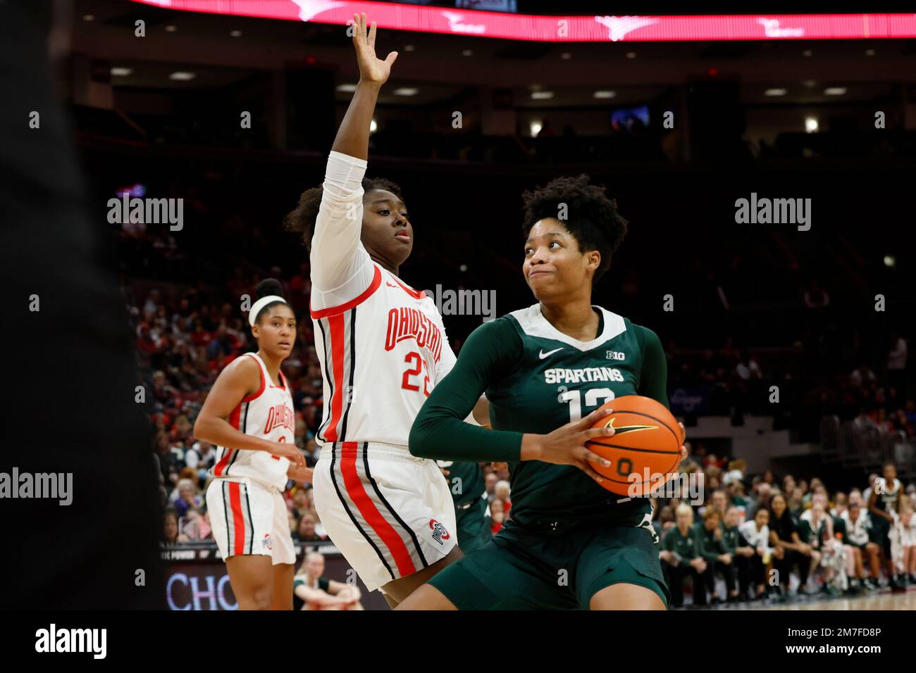 Michigan State's Isaline Alexander, right, posts up against Ohio State ...