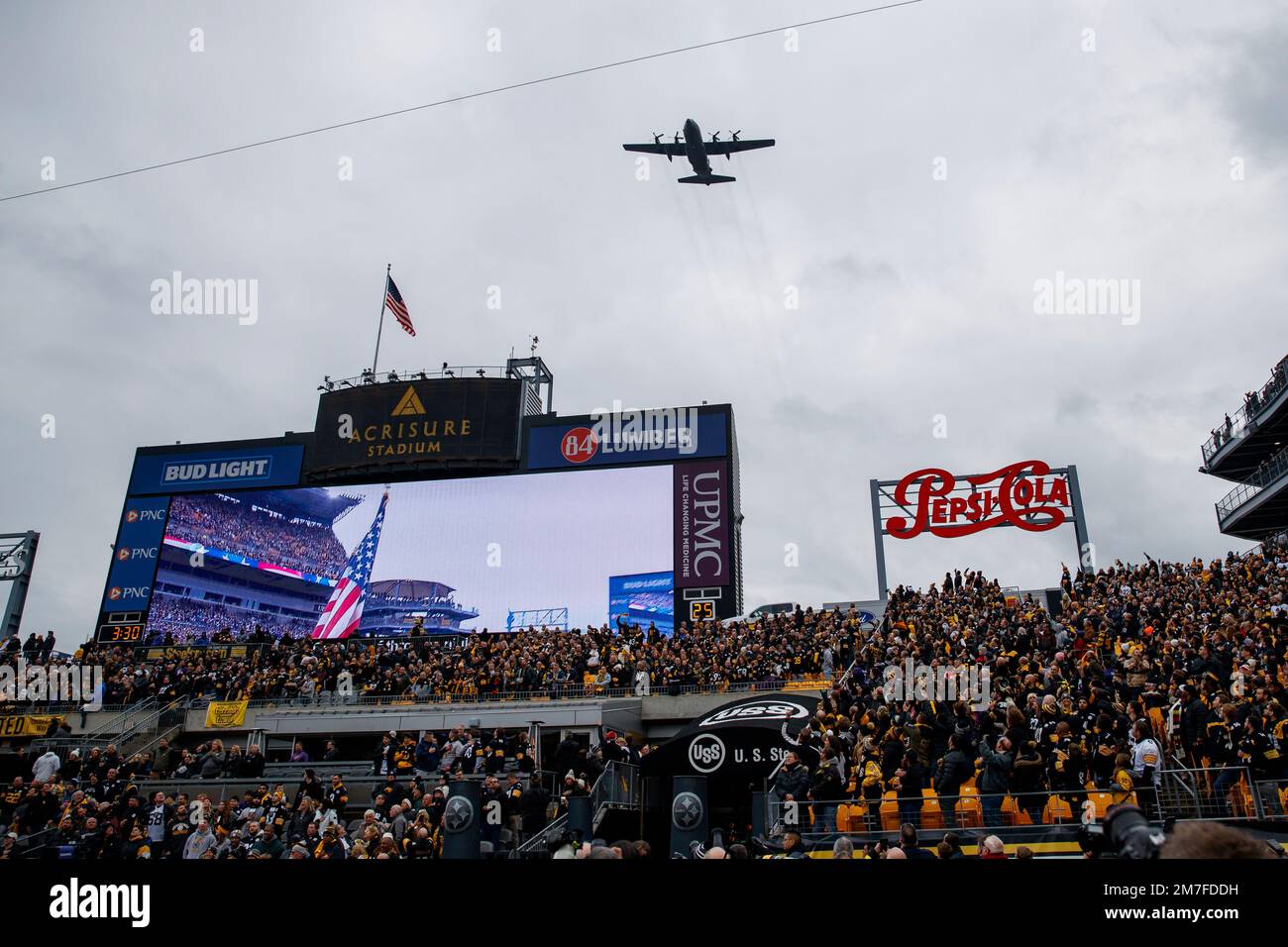 A flyover is shown during the National Anthem before an NFL football ...