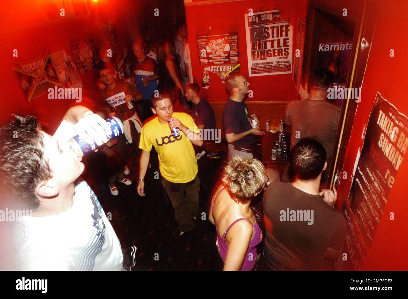 SWEATY CLUB GIG, 2003: Crowd in a side bar and drink and watch the ...