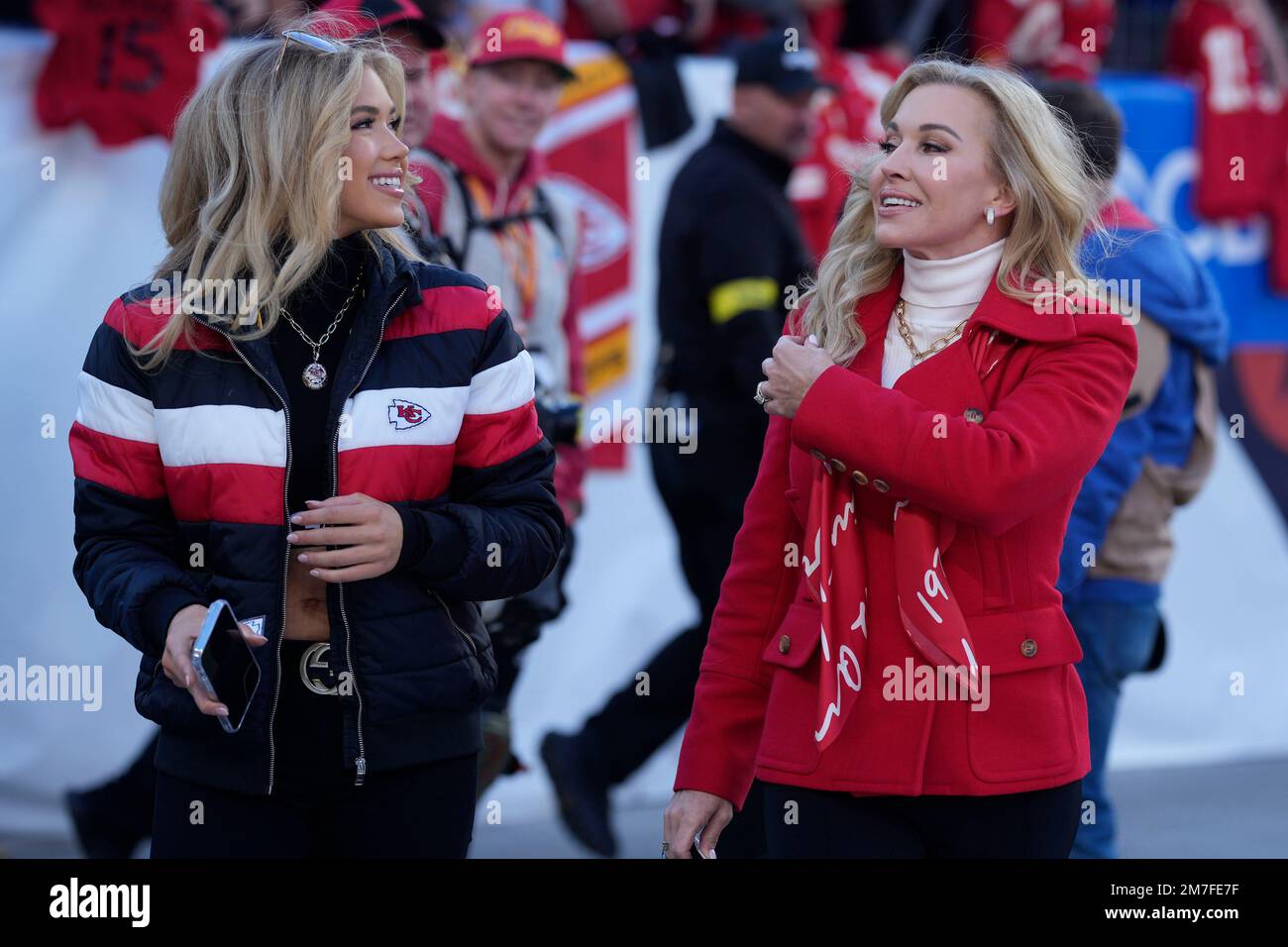 Gracie Hunt and her mom Tavia walk on the sideline before an NFL ...