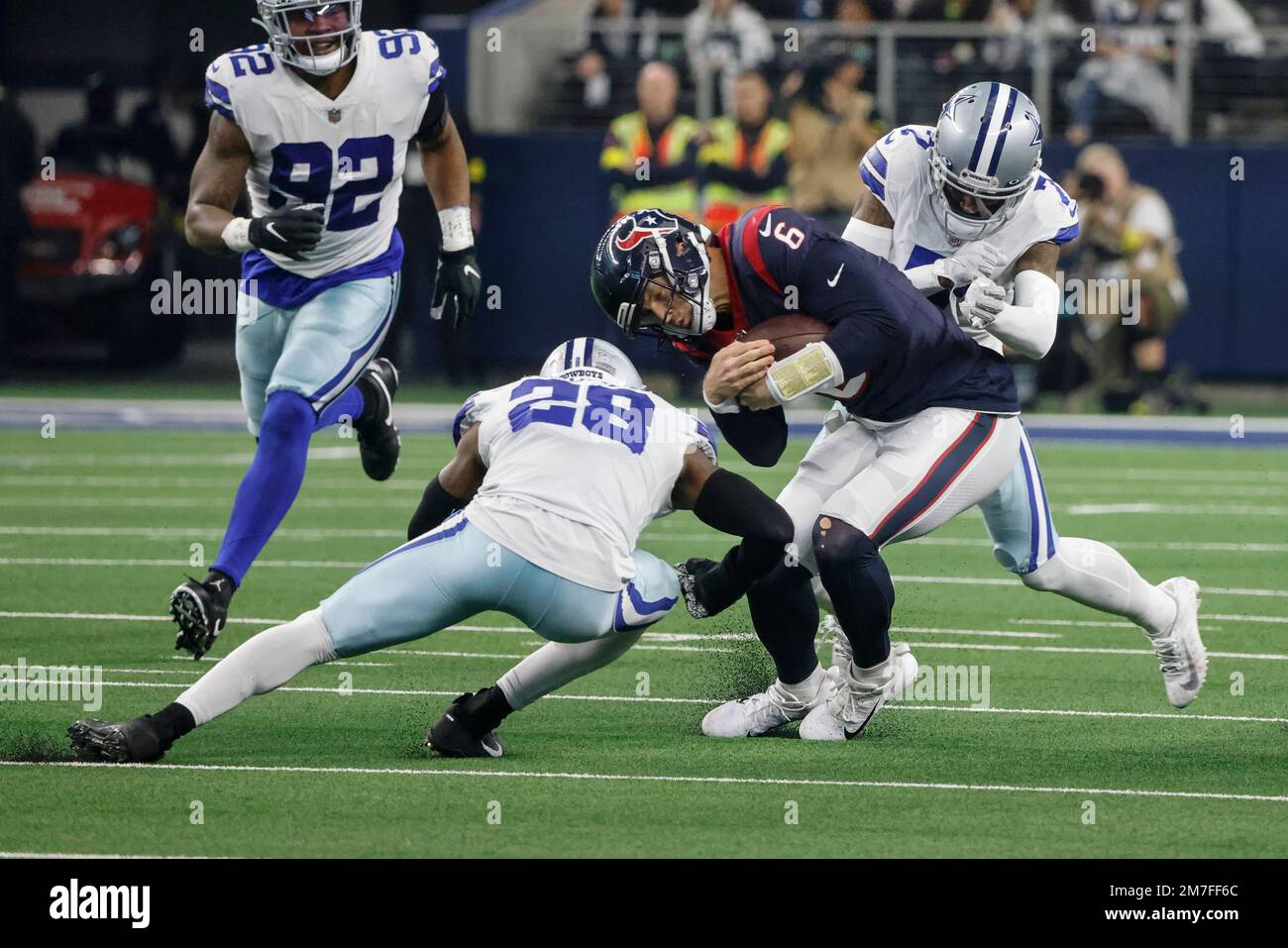 Houston Texans quarterback Jeff Driskel (6) is tackled by Dallas ...