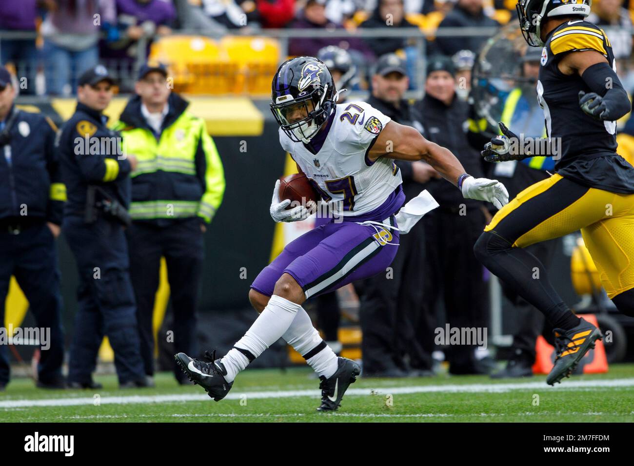 Baltimore Ravens running back J.K. Dobbins (27) stops in front of ...
