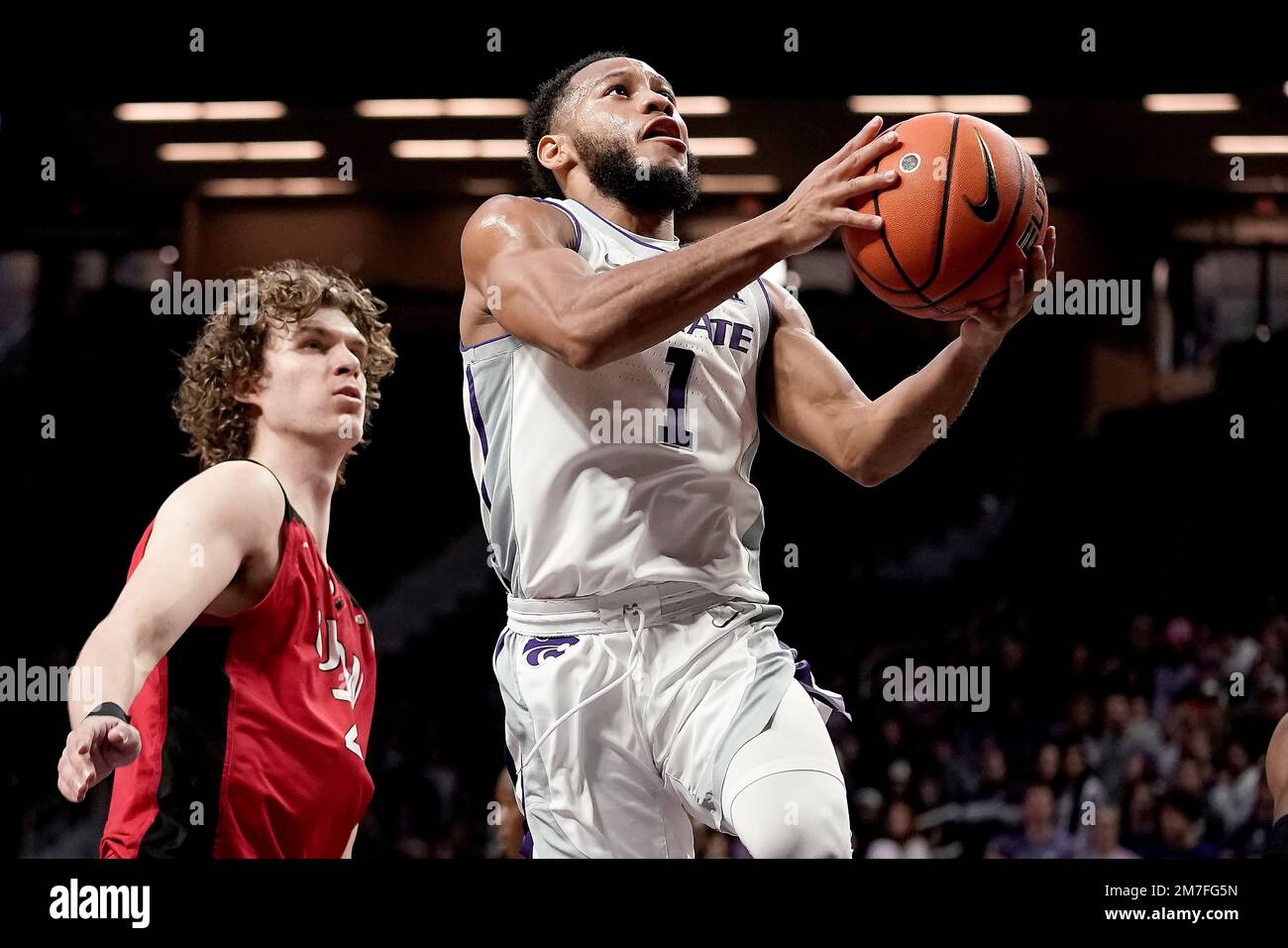 Kansas State guard Markquis Nowell (1) gets past Incarnate Word forward ...