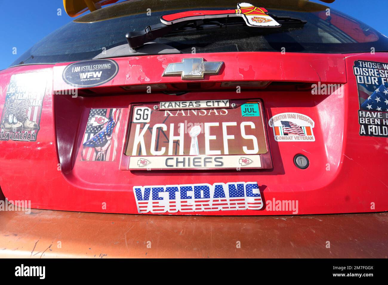 A car is decorated in a Kansas City Chiefs theme before an NFL football ...