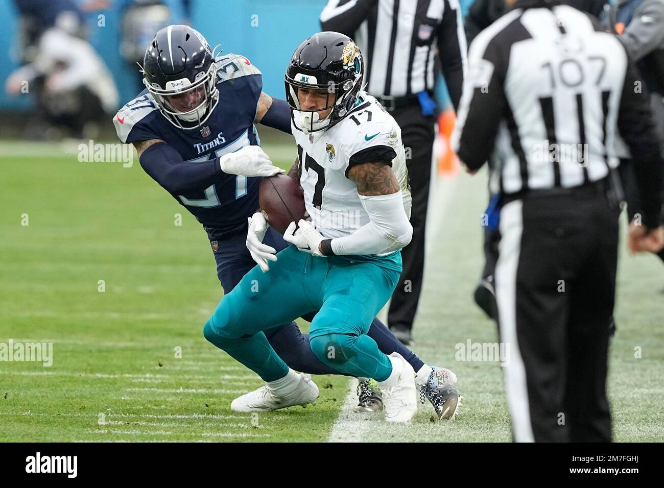 Jacksonville Jaguars tight end Evan Engram (17) is knocked out of ...