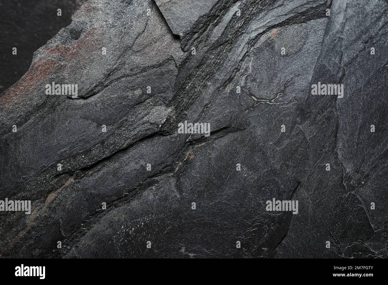 Background of black cladding stone Stock Photo - Alamy