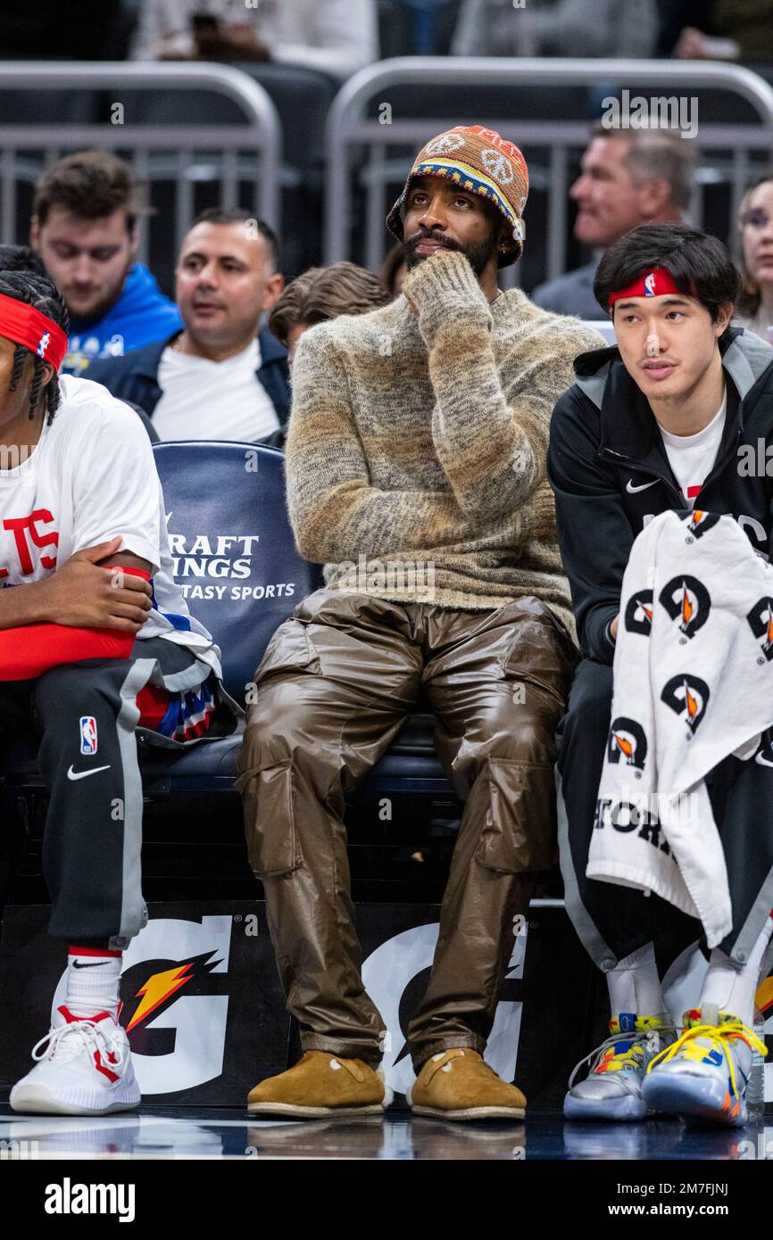 Brooklyn Nets guard Kyrie Irving, center, on the team's bench during ...
