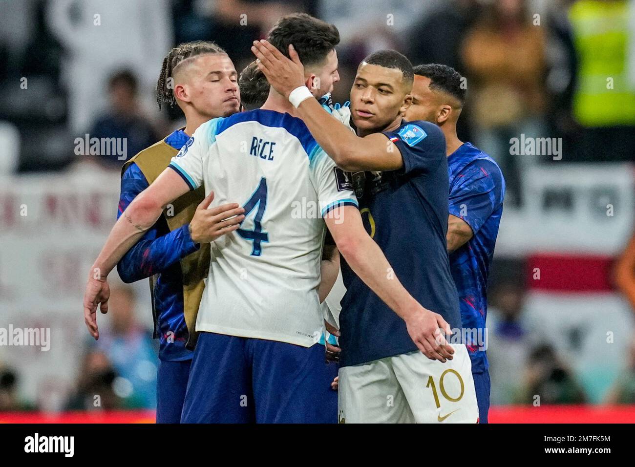 France's Kylian Mbappe comforts to England's Declan Rice at the end of ...