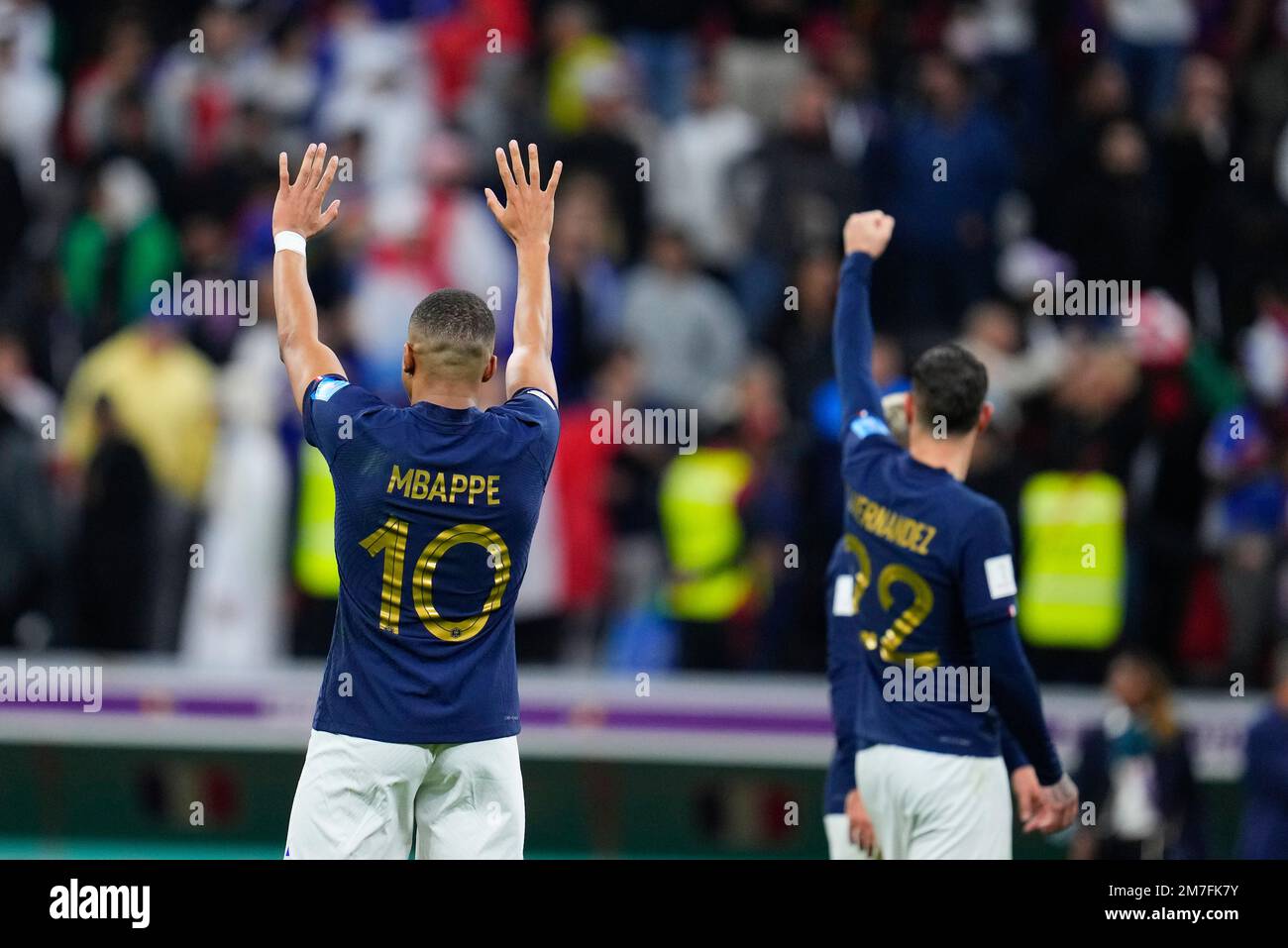 France's Kylian Mbappe gestures to supporters following the World Cup ...