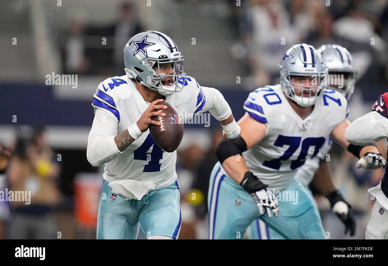 Dallas Cowboys quarterback Dak Prescott (4) scrambles as he looks to ...