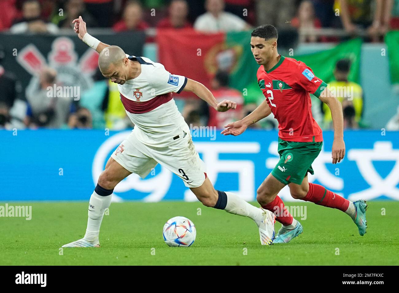 Portugal's Pepe in action by Morocco's Achraf Hakimi during the World ...