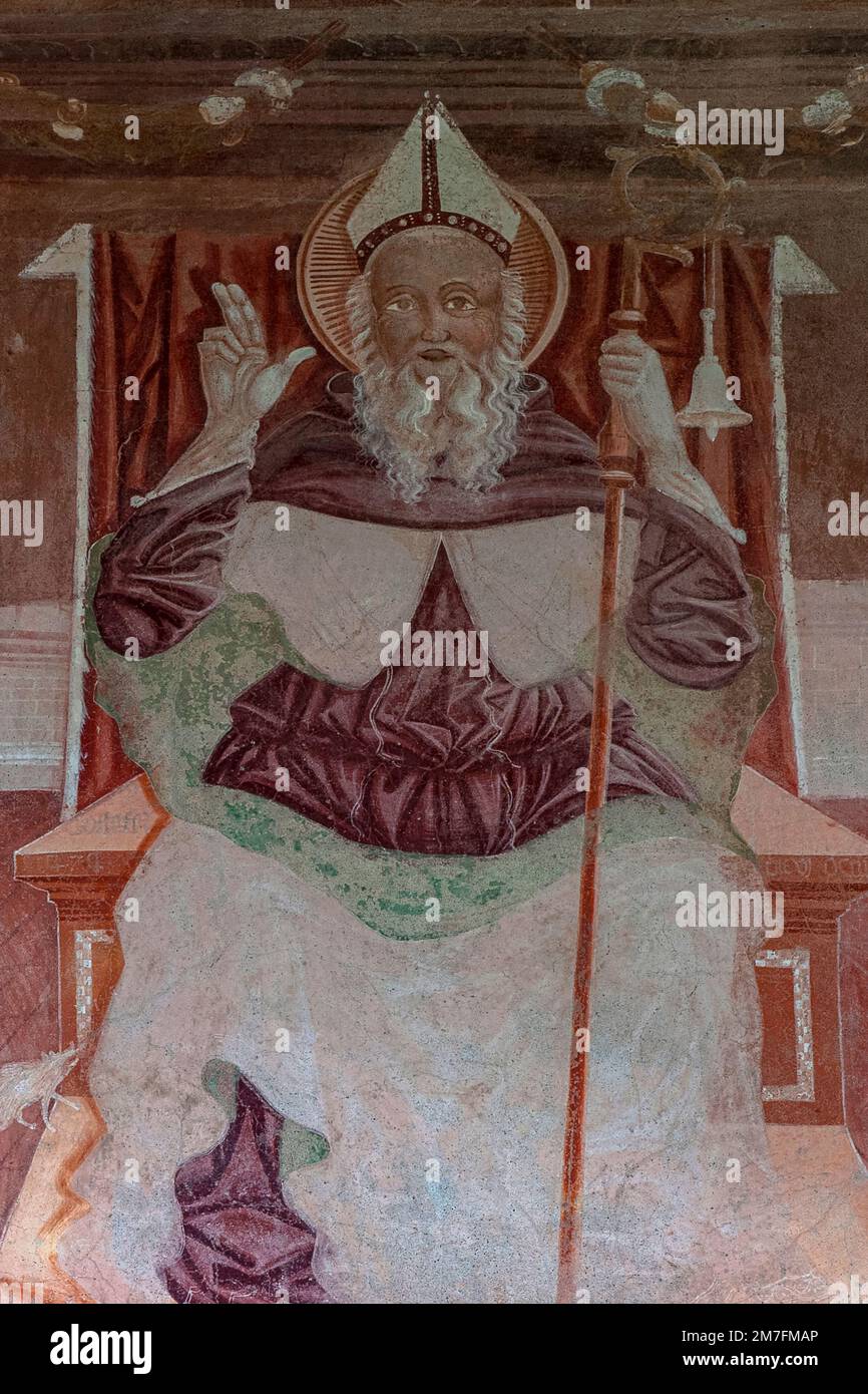 St Anthony the Abbot: enthroned saint with forked white beard makes ...