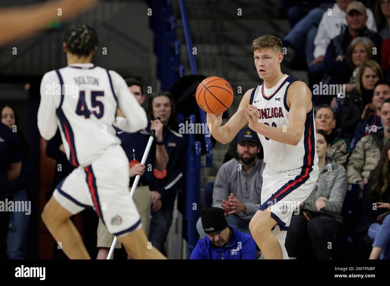 Gonzaga forward Ben Gregg, right, passes the ball to guard Rasir Bolton ...