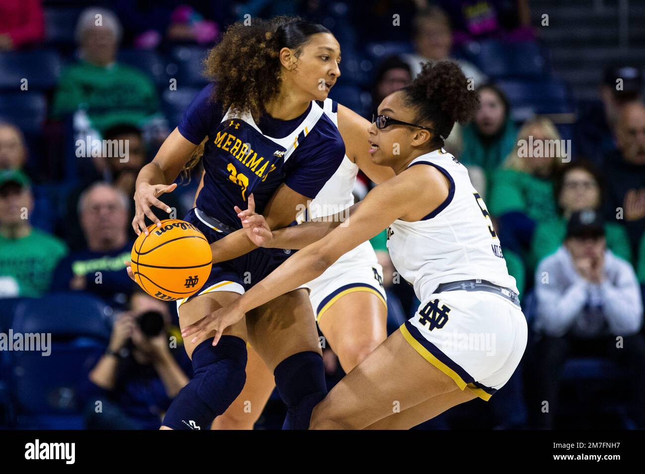 Notre Dame's Olivia Miles, right, knocks the ball away from Merrimack's ...