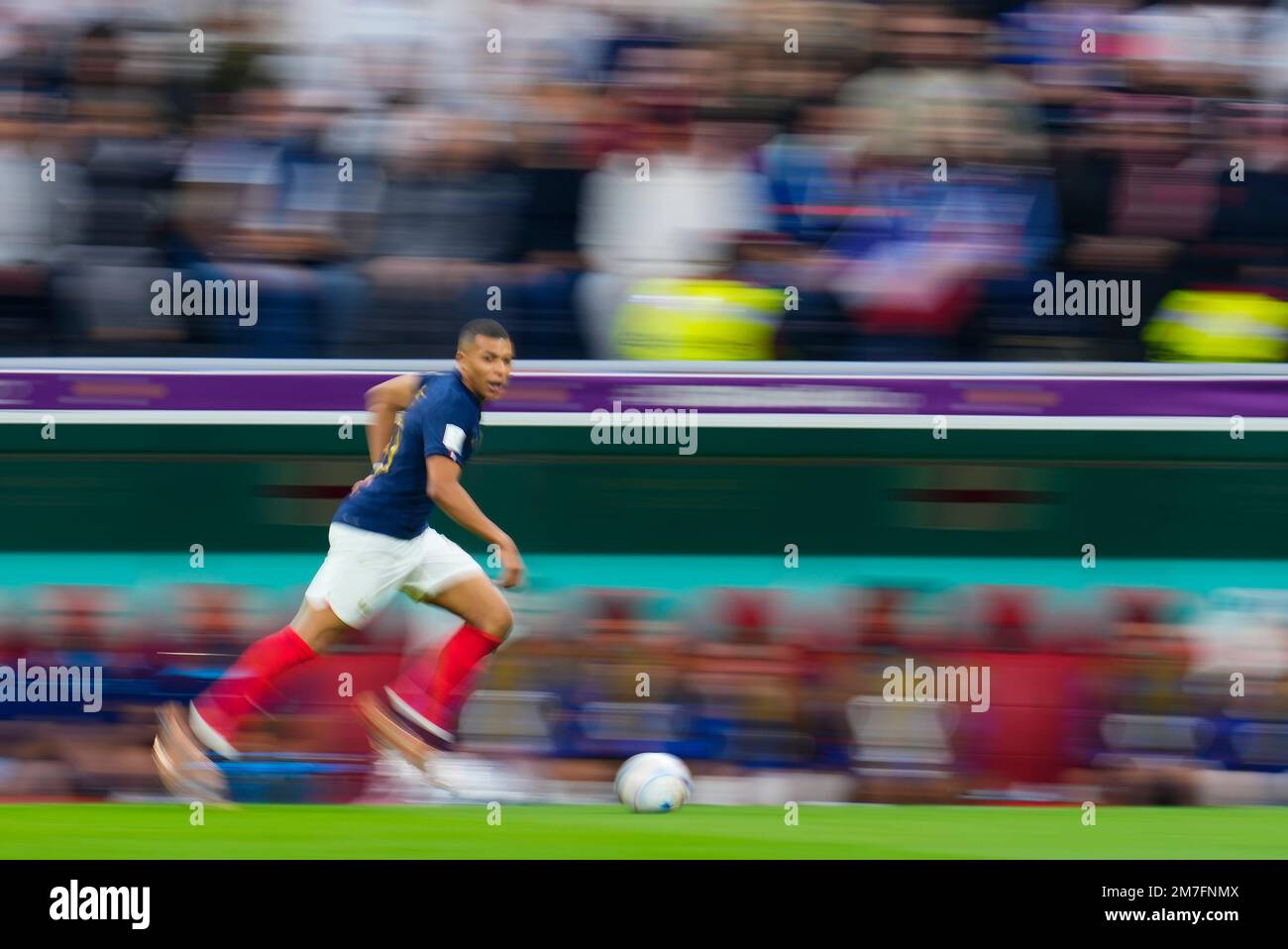 France's Kylian Mbappe runs with the ball during the World Cup ...