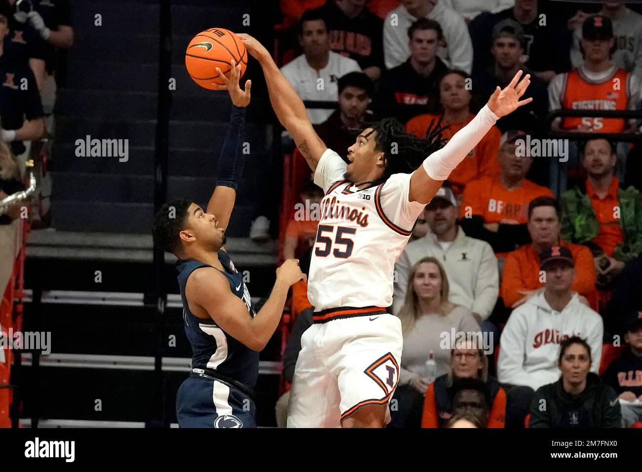 Illinois 's Skyy Clark (55) blocks the shot of Penn State's Camren Wynter during the first half ...