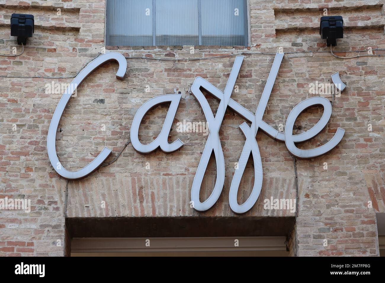 Old store signs in Urbino, Italy Stock Photo - Alamy