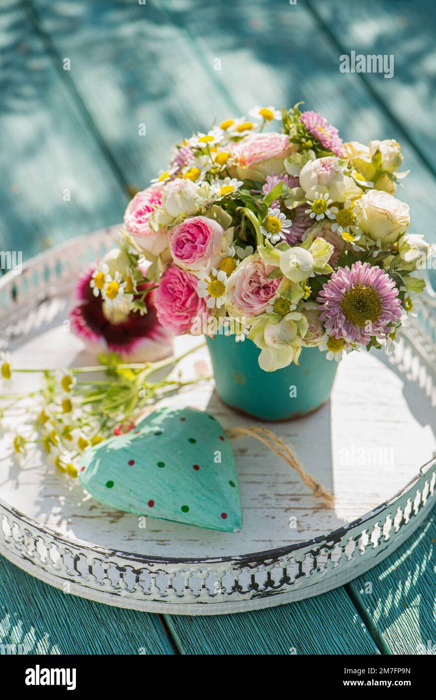 Little flower bouquet with pink roses Stock Photo - Alamy