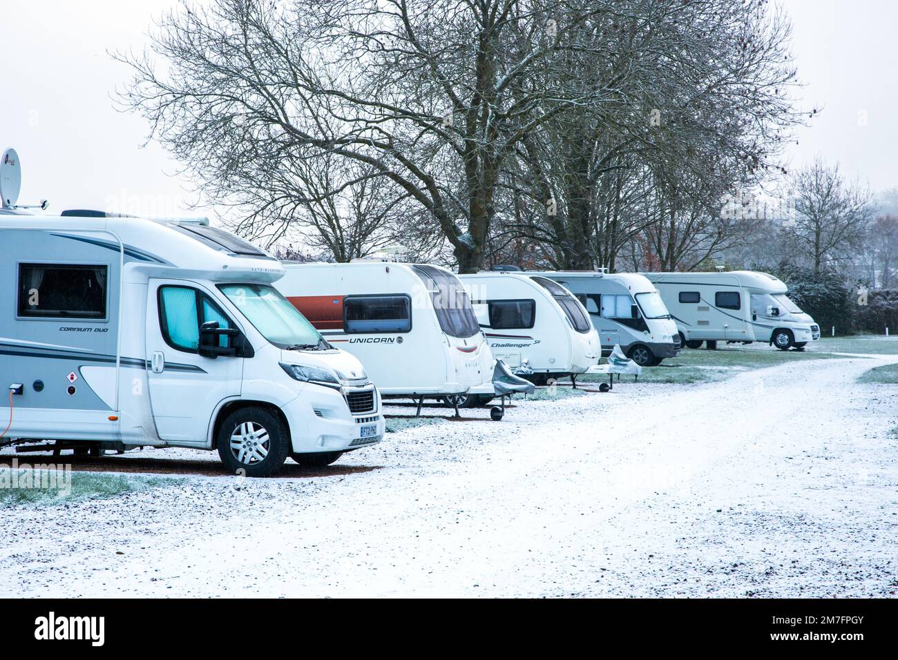 Caravans on Warwick caravan club camp site during a winter snowfall ...