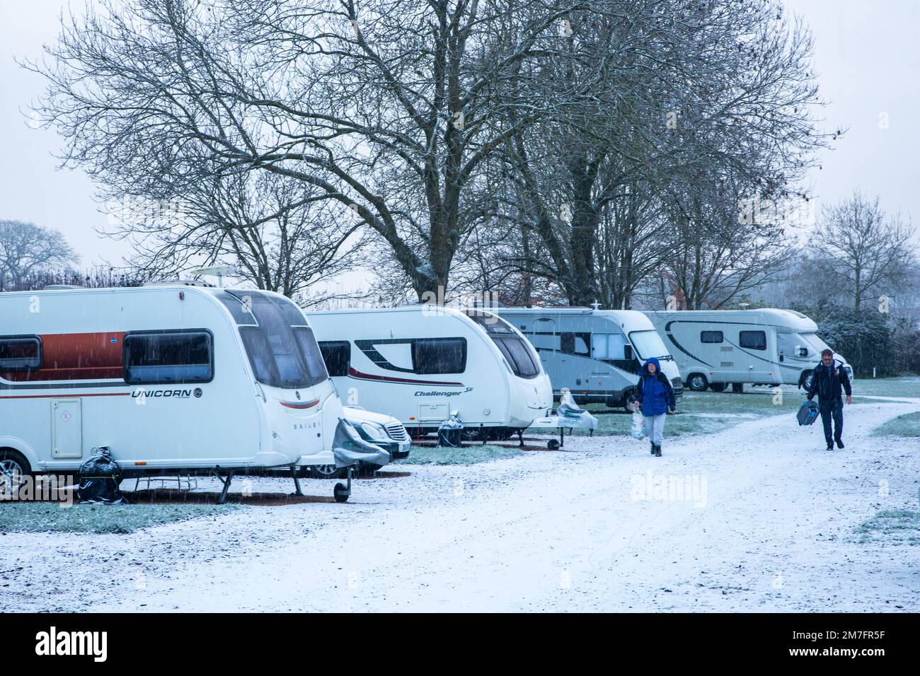 Caravans on Warwick caravan club camp site during a winter snowfall ...
