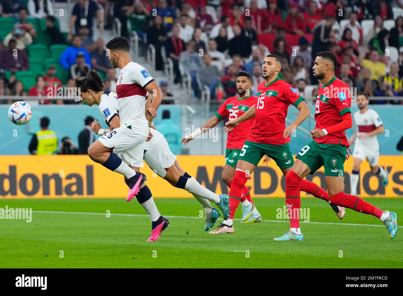 Portugal's Joao Felix, left, attempts a head at goal during the World ...