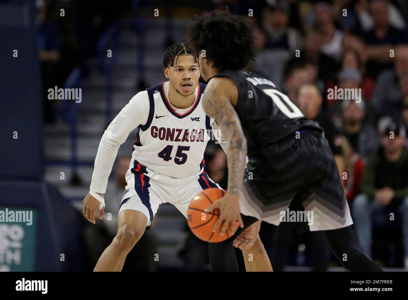 Gonzaga guard Rasir Bolton (45) defense Washington guard Koren Johnson ...