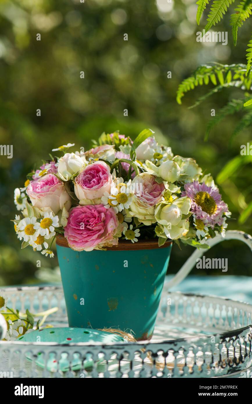 Little flower bouquet with pink roses Stock Photo - Alamy