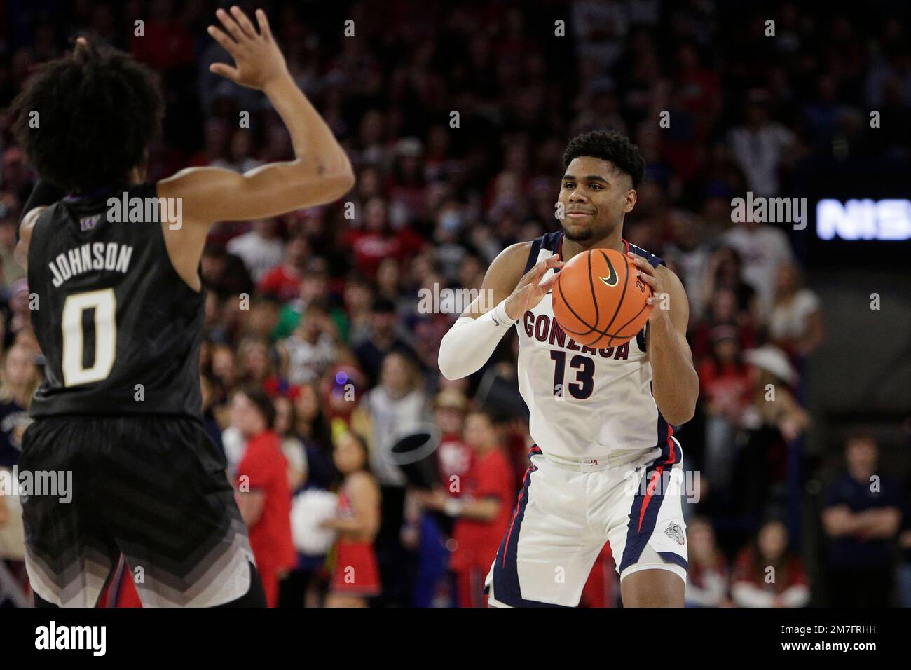 Gonzaga guard Malachi Smith (13) controls the ball while defended by ...