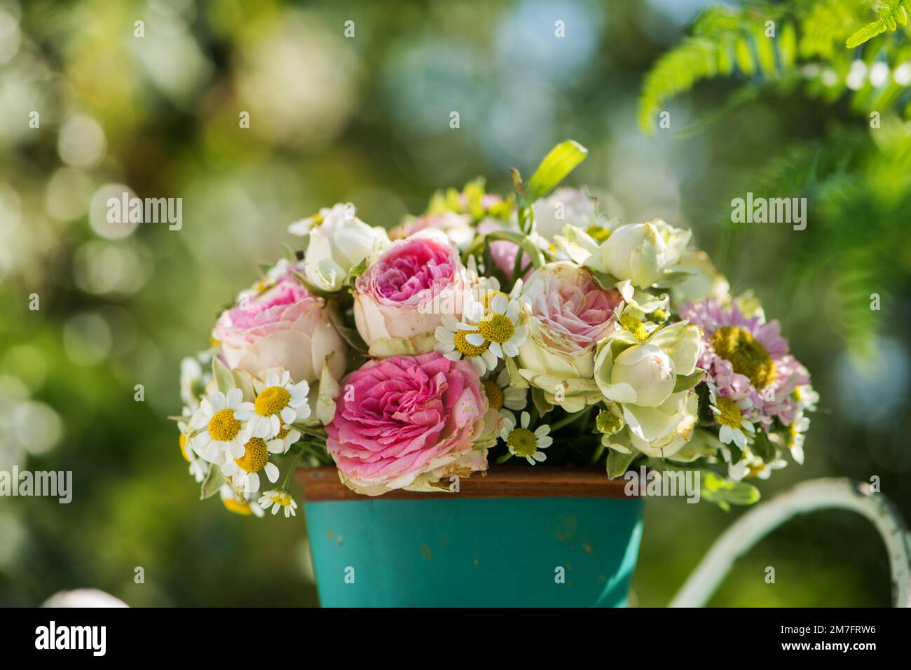 Little flower bouquet with pink roses Stock Photo - Alamy
