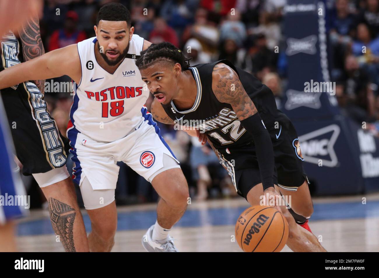 Memphis Grizzlies guard Ja Morant (12) drives to the basket defended by ...