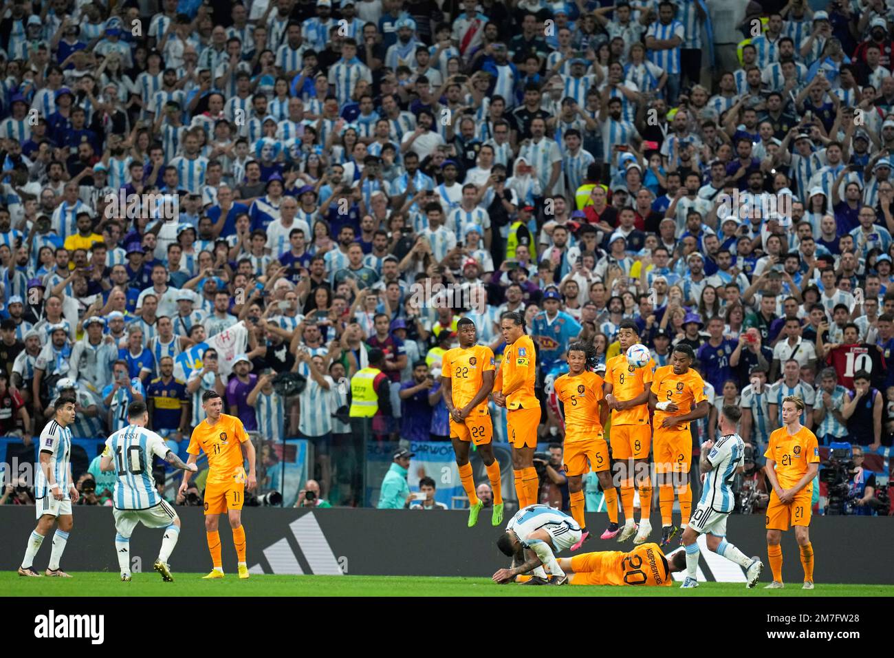 Argentina's Lionel Messi, 2nd left, takes a free kick during the World ...