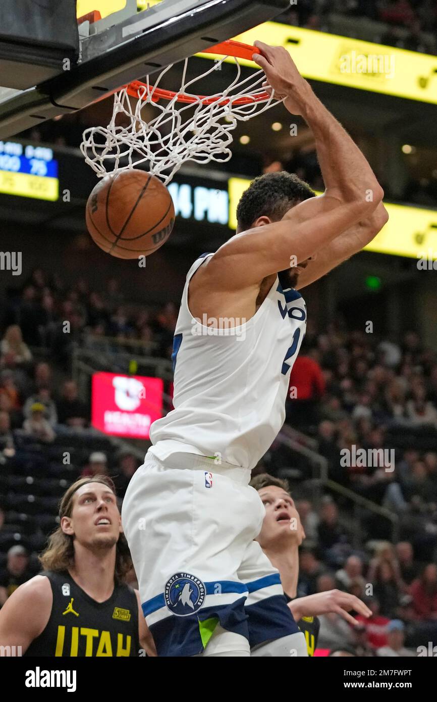 Minnesota Timberwolves center Rudy Gobert dunks as Utah Jazz center Walker Kessler, right, and ...