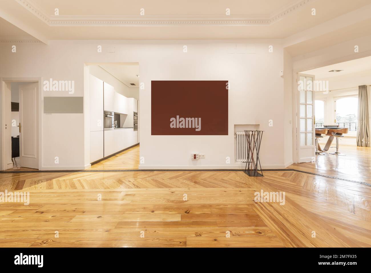 Empty exhibition room with red pine flooring with long varnished slats ...