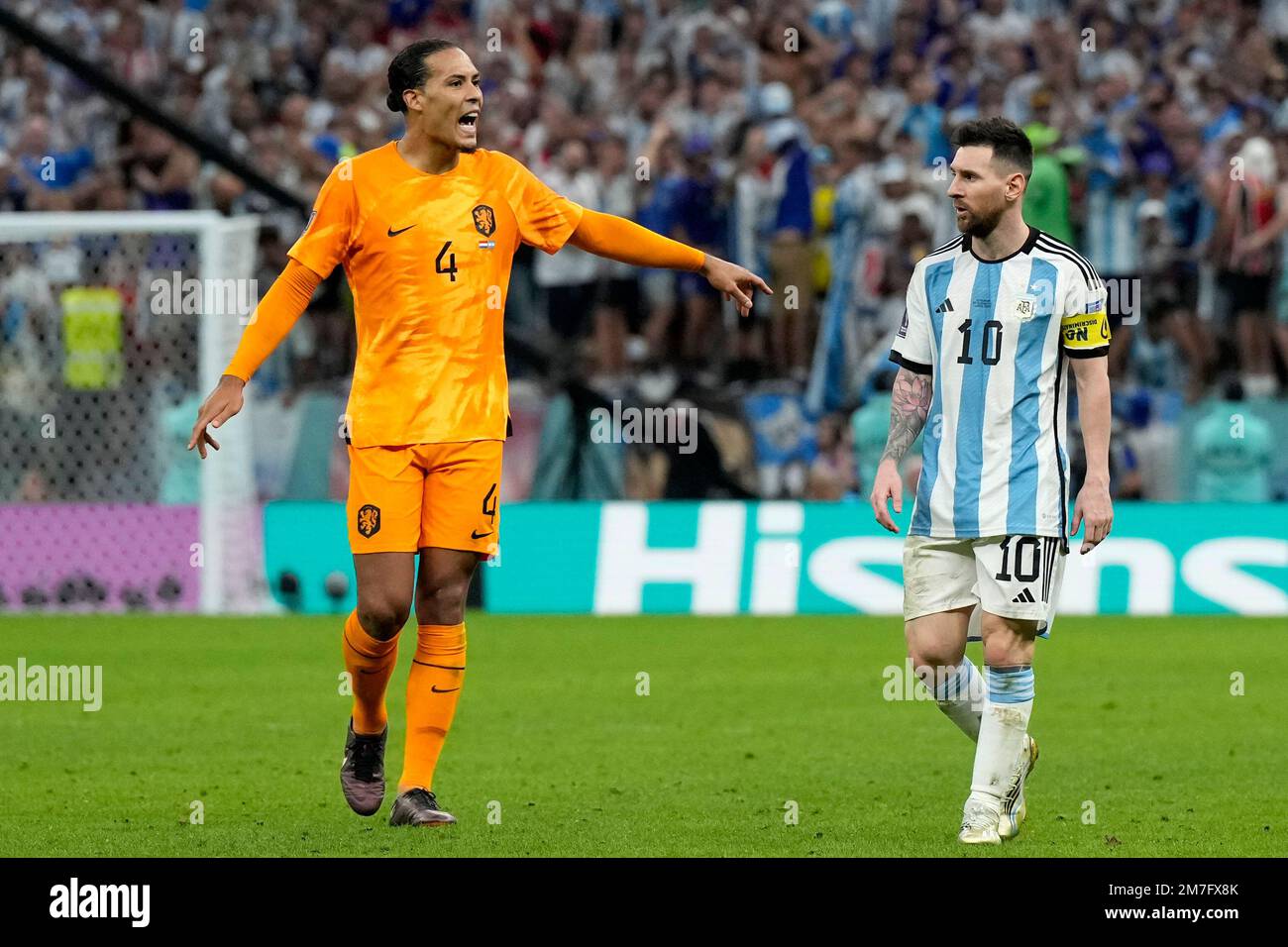 Argentina's Lionel Messi looks at Virgil van Dijk of the Netherlands ...