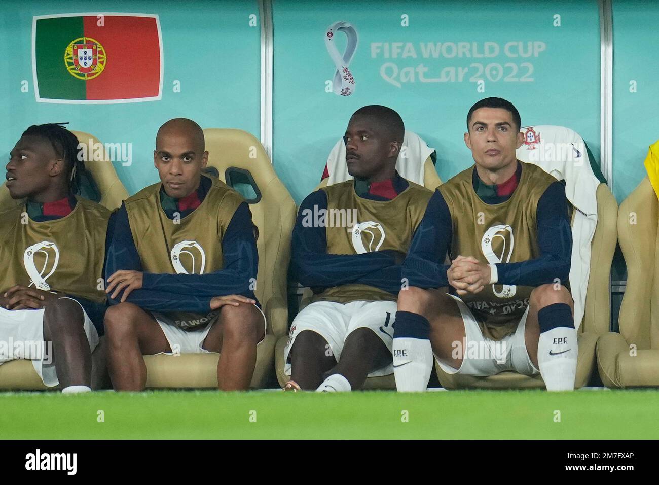 Portugal's Cristiano Ronaldo, right, sits on the bench during the World ...