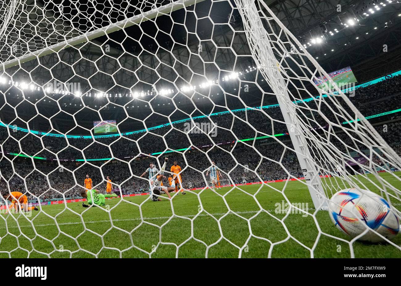 Argentina's Nahuel Molina, centre, after scoring the opening goal ...