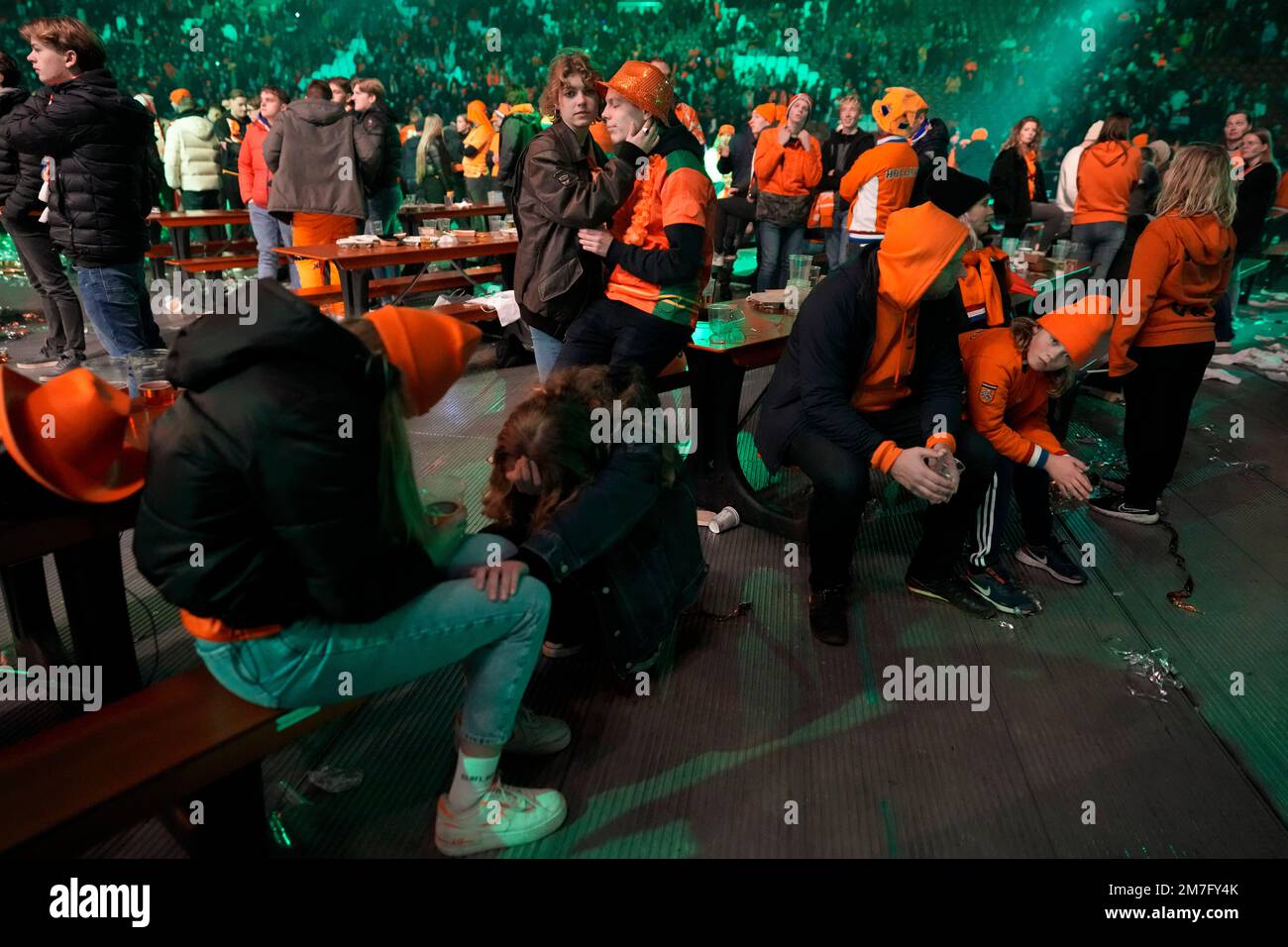 A dejected Netherlands fan is comforted by his girlfriend after the ...