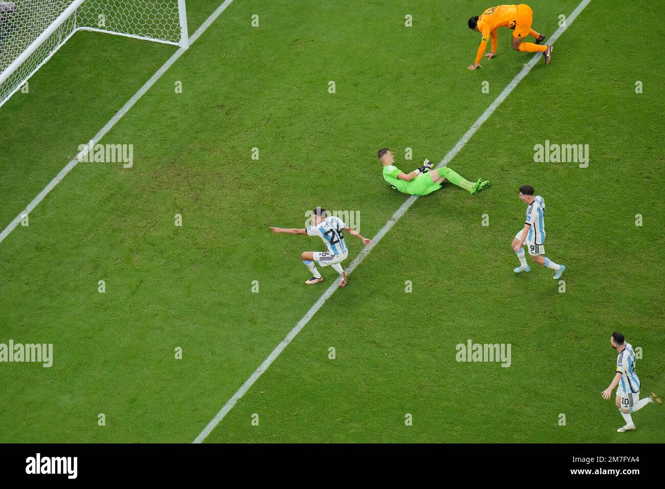 Argentina's Nahuel Molina, center, celebrates his opening goal during ...