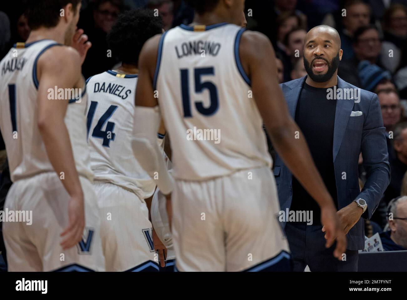 Villanova head coach Kyle Neptune talks to his players during an NCAA ...