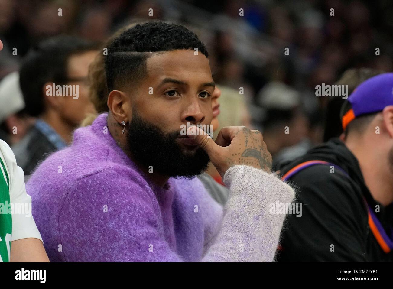 NFL player Odell Beckham Jr. watches action during the first half of an ...