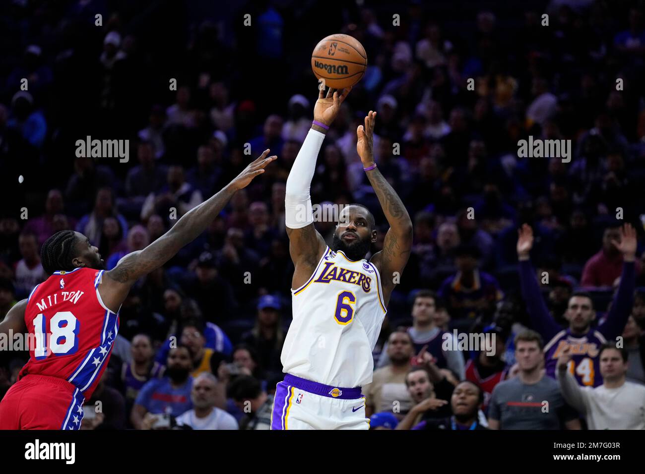 Los Angeles Lakers' LeBron James, right, goes up for a shot against ...