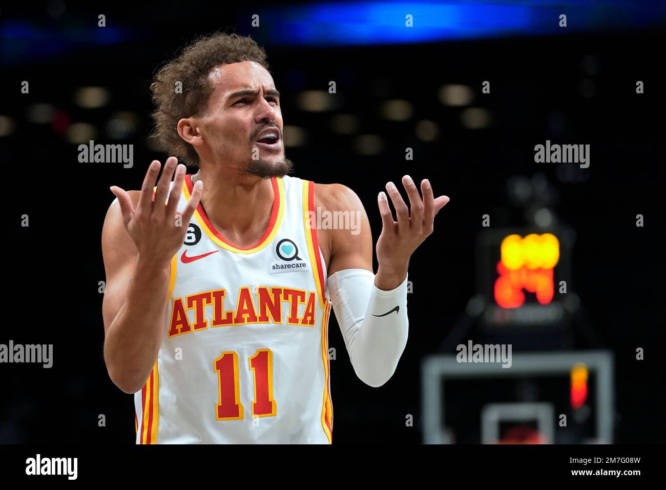 Atlanta Hawks guard Trae Young reacts during the first half of the team ...