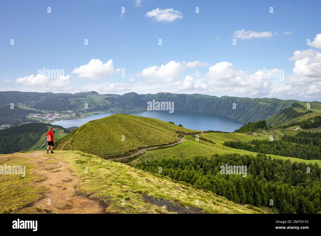 Hiker enjoying the scenic views of the caldera on São Miguel island in ...
