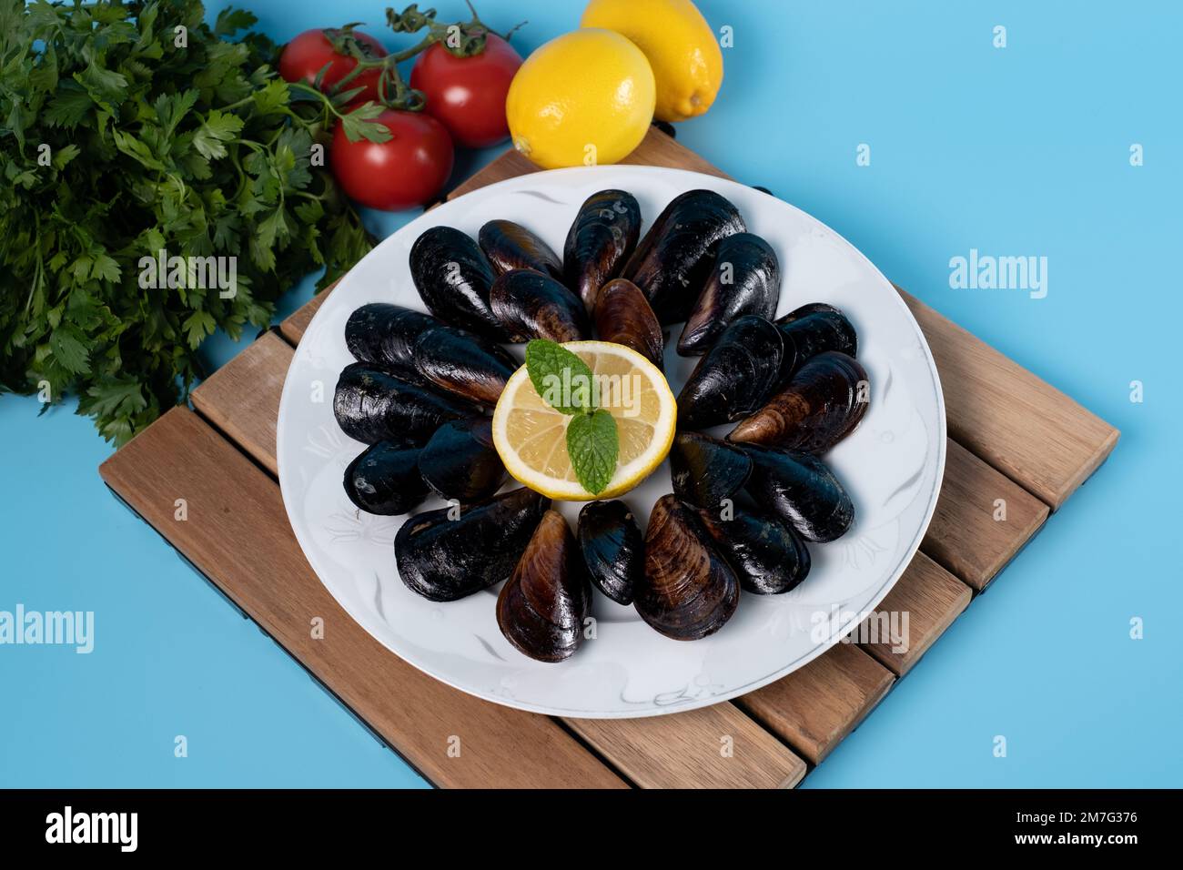 Turkish Street Food Stuffed Mussels and Lemon on Plate Isolated Yellow ...