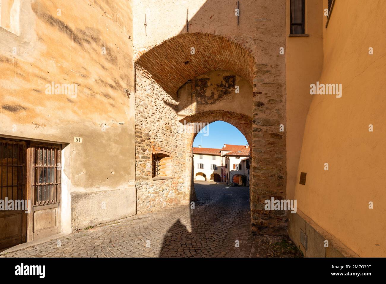 Peveragno, Cuneo, Italy - January 09, 2023: Arch of the Ricetto ancient ...