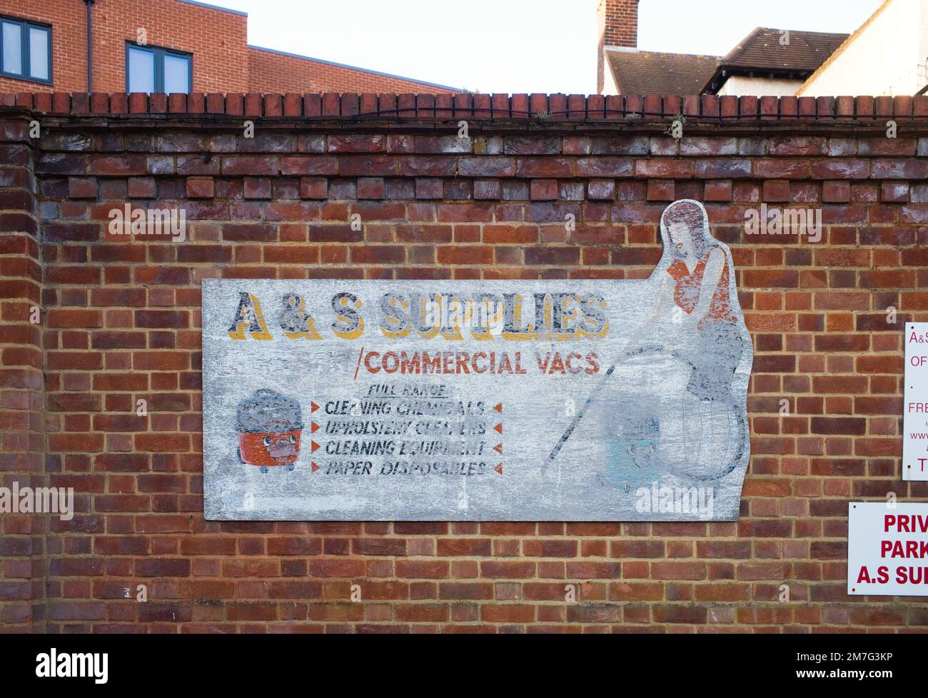 Old sign on a wall in Letchworth for company suppling cleaning products ...