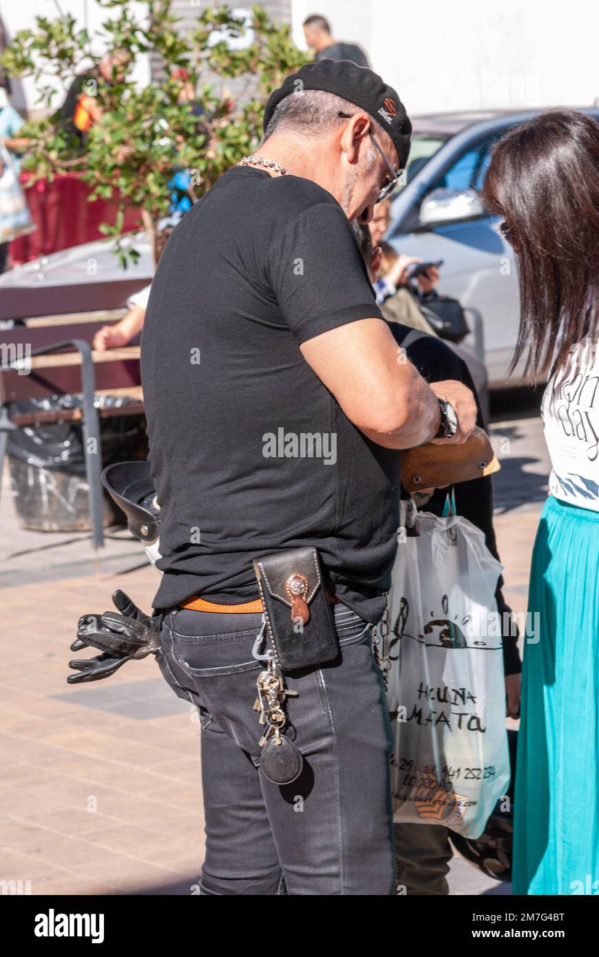 Photo of bikers, with their motorcycles representing the biker custom ...