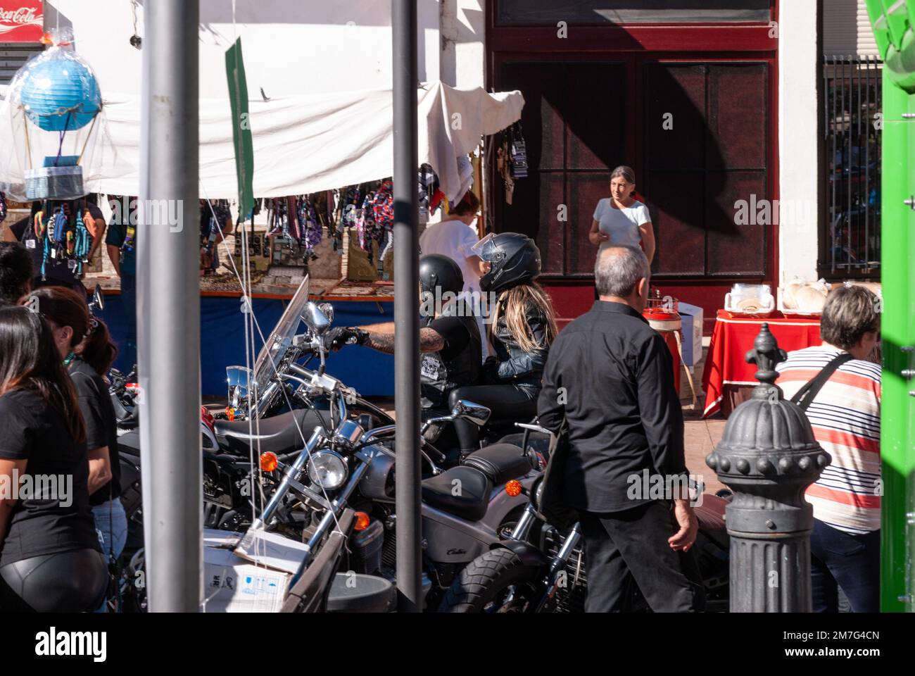 Photo of bikers, with their motorcycles representing the biker custom ...