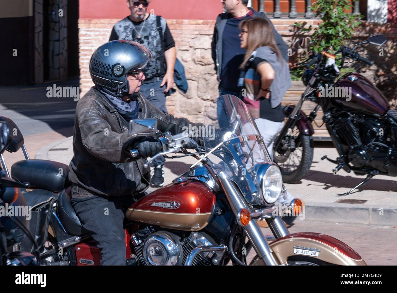 Photo of bikers, with their motorcycles representing the biker custom ...